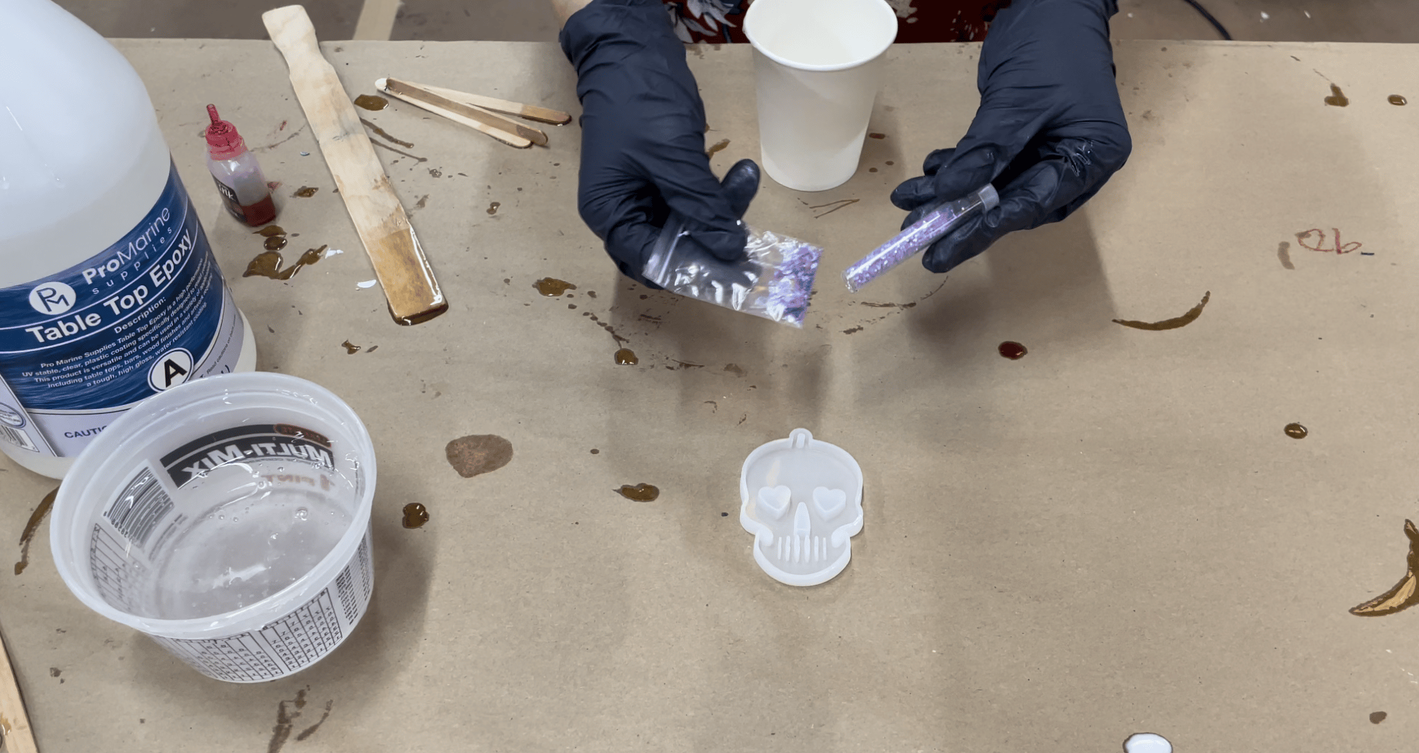 Purple-glitter-additives-for-resin-held-up - Resin Crafts Blog