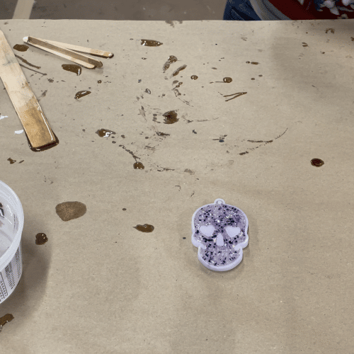 Purple-glitter-additives-for-resin-held-up - Resin Crafts Blog